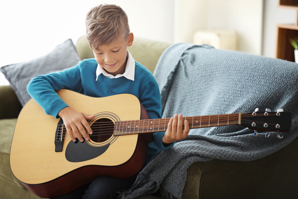 Why Should Your Child Play Guitar Lessons In Your Home